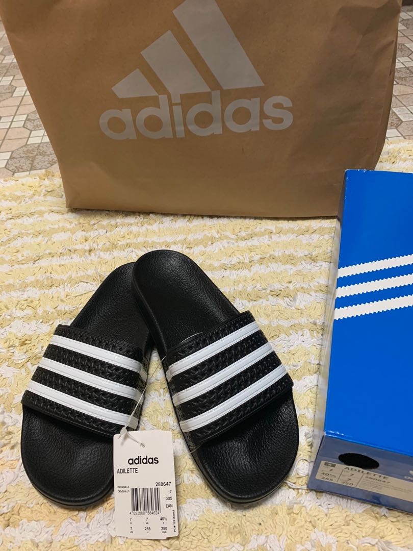 Adidas slipper, Women's Fashion, Footwear, Flipflops and Slides on ...