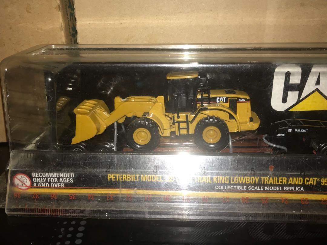 Cat caterpillar peterbilt model 389 with trail king lowboy trailer and ...