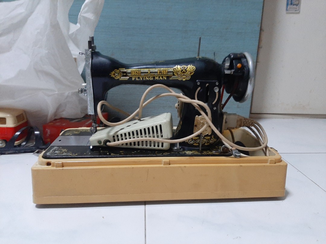 Vintage Flying Man Sewing Machine, Hobbies & Toys, Memorabilia ...