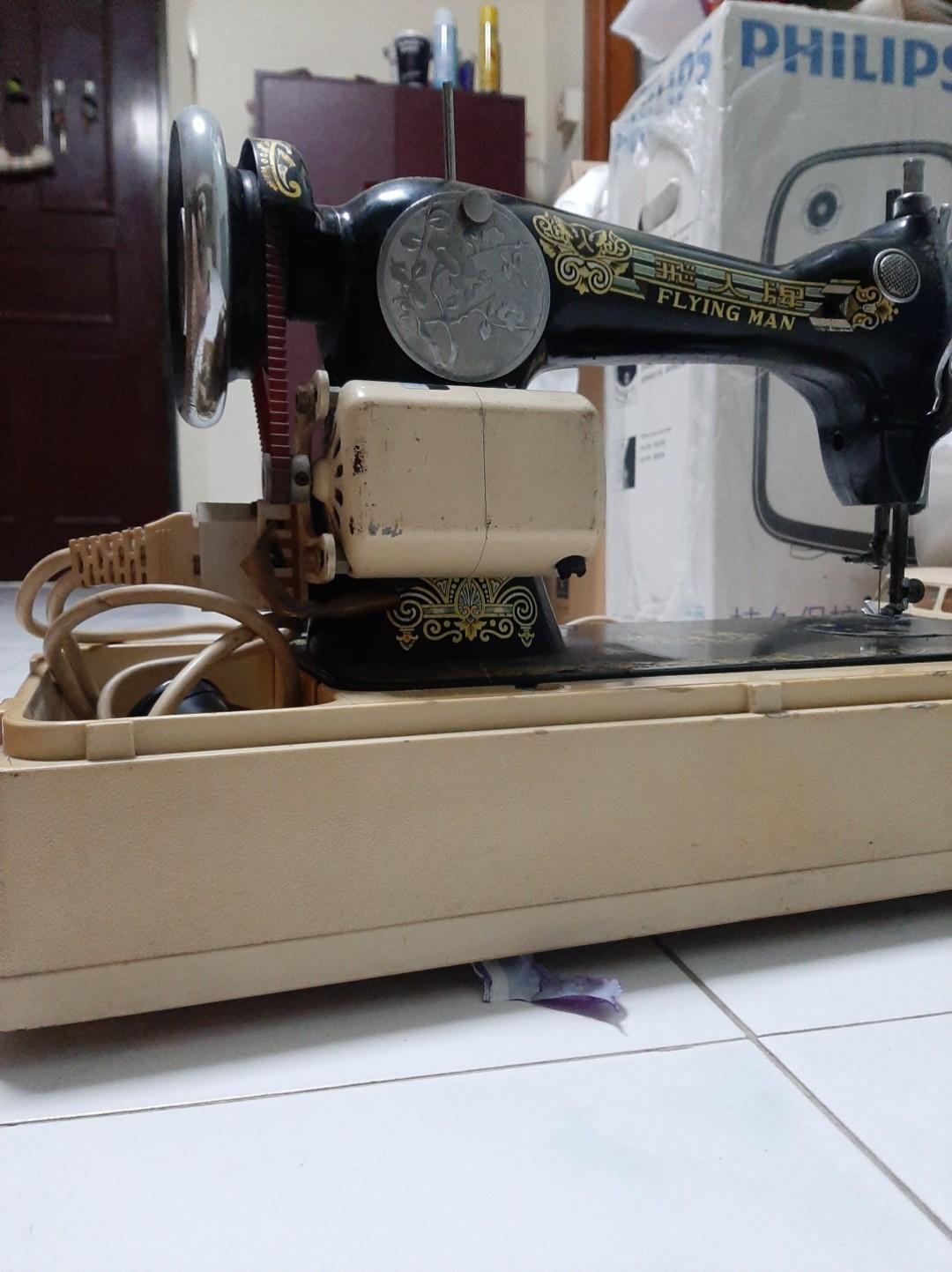 Vintage Flying Man Sewing Machine, Hobbies & Toys, Memorabilia ...