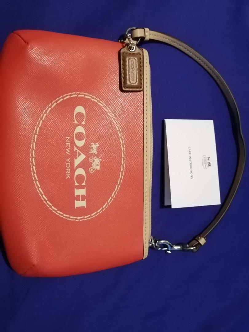 Coach pouch, Luxury, Bags & Wallets on Carousell