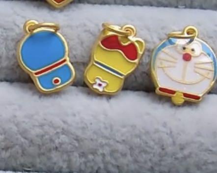 999 gold-doraemon, Luxury, Accessories on Carousell