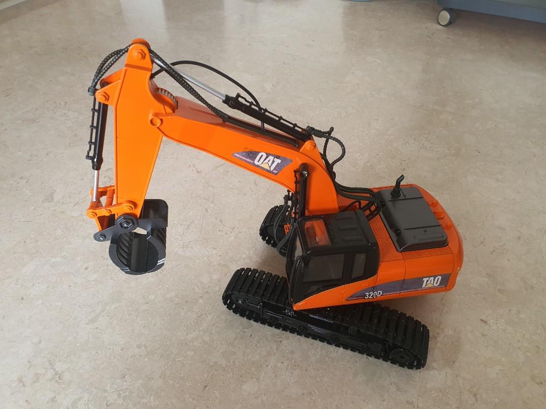 Huina RC Grabber Excavator, Hobbies & Toys, Toys & Games on Carousell