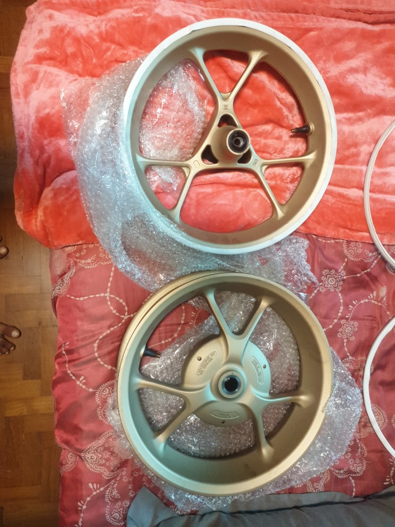 Aerox gold stock rim, Motorcycles, Motorcycle Accessories on Carousell