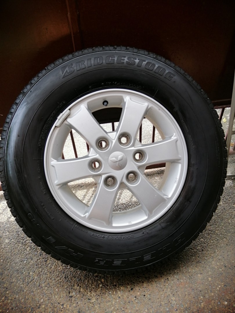 16 inch Mitsubishi Strada stock mags and tires, Car Parts & Accessories ...