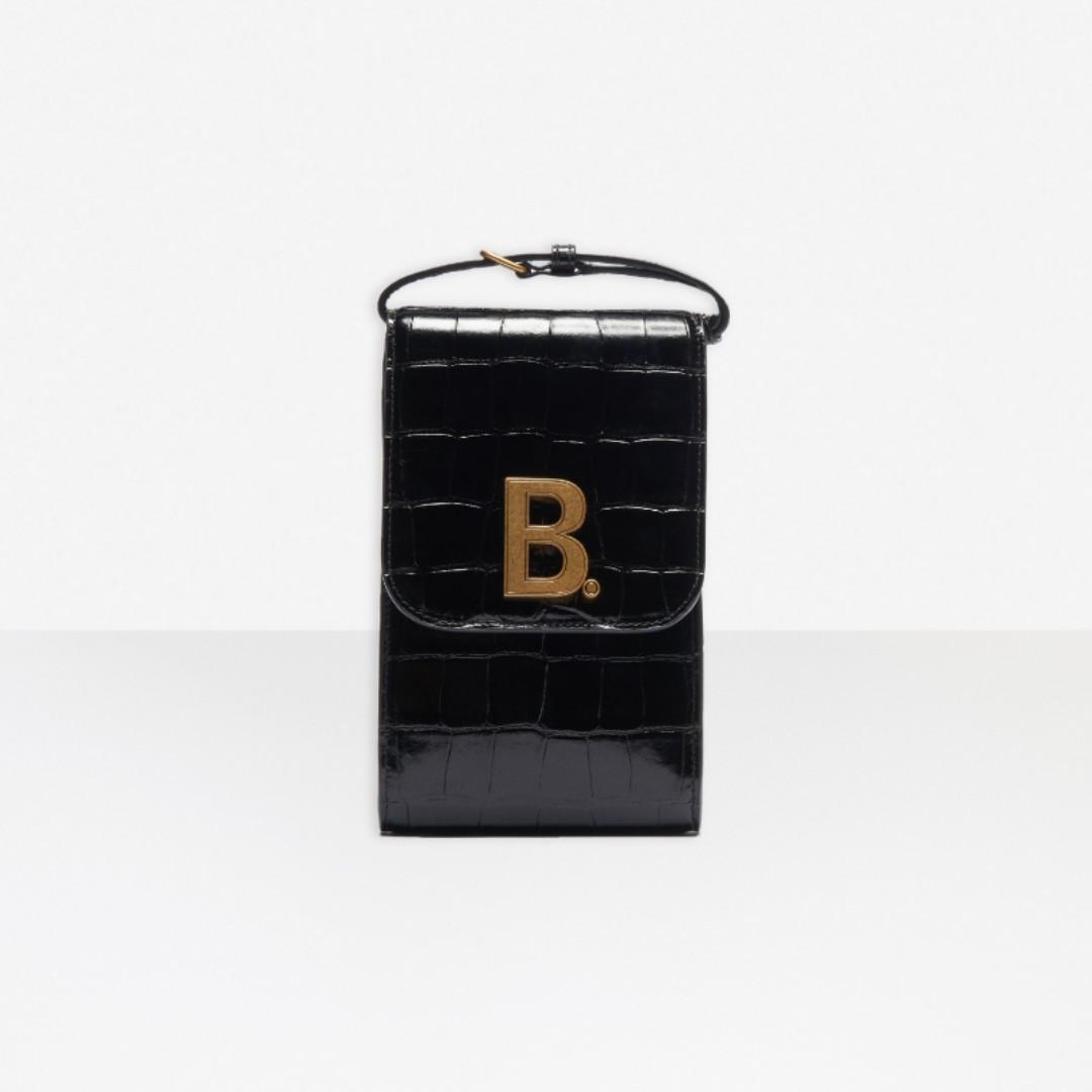Balenciaga B. Phone Holder #Bags15Off , Luxury, Bags & Wallets on Carousell