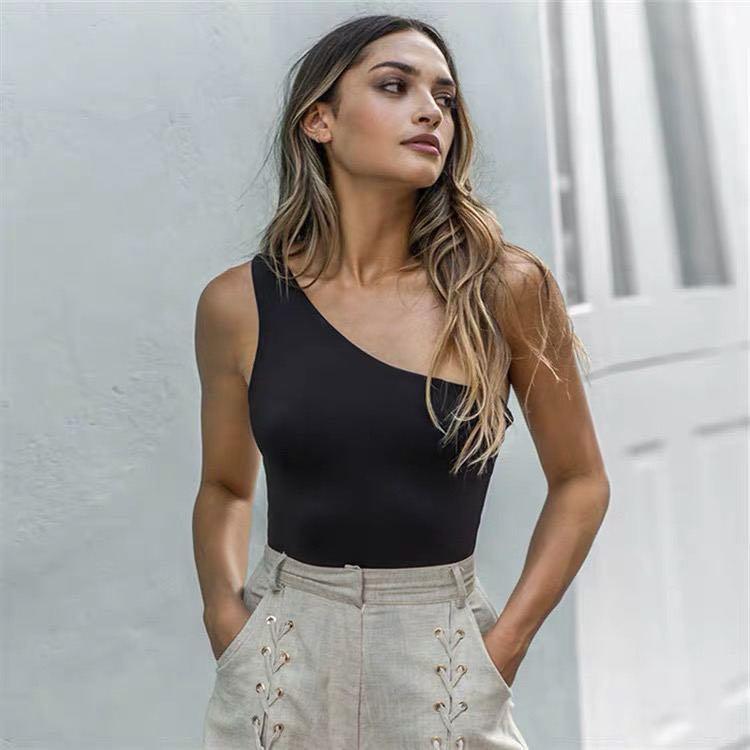 Bodysuit toga in black, Women's Fashion, Tops, Sleeveless on Carousell