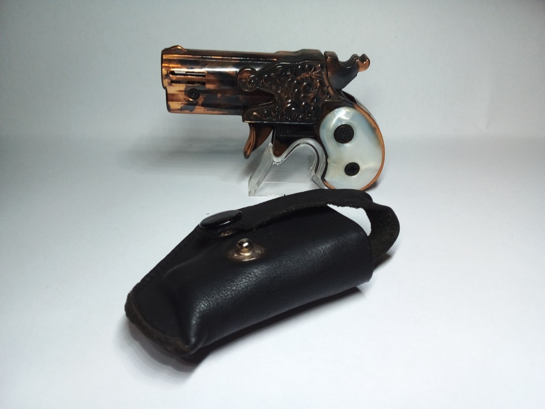 Vintage gun shaped lighter with belt hoister, Vintage & Collectibles ...
