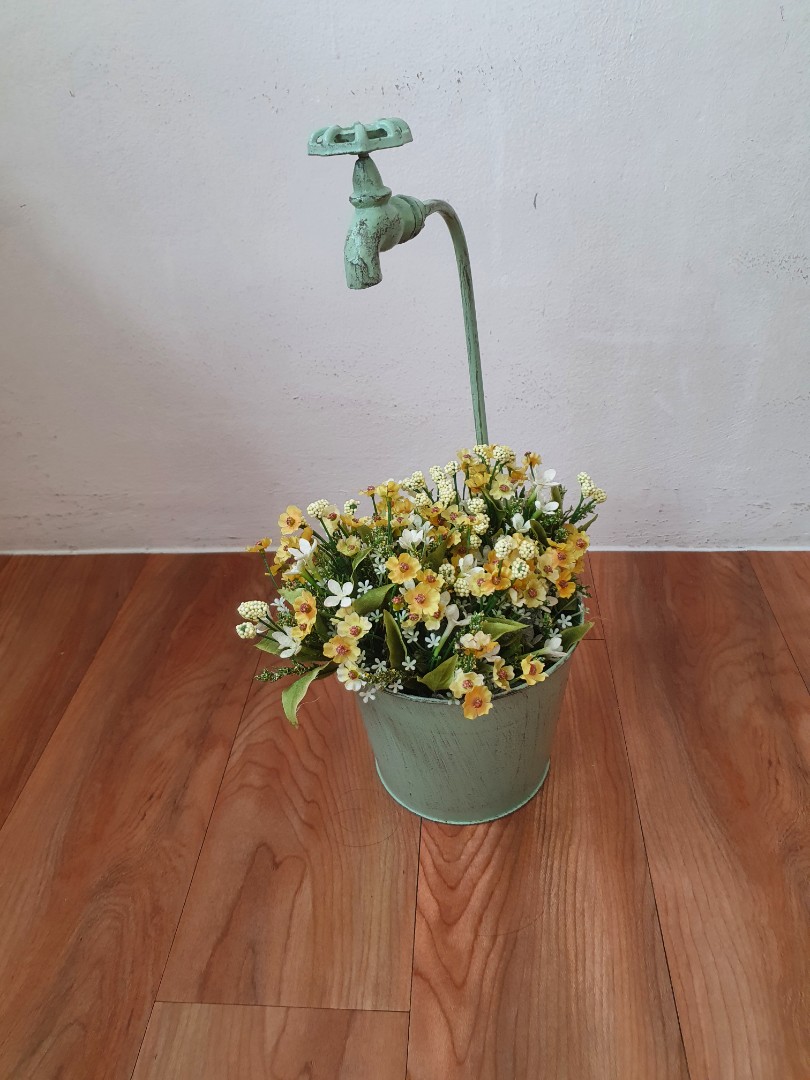 Home decor garden tap and pail with flowers, Everything Else on Carousell