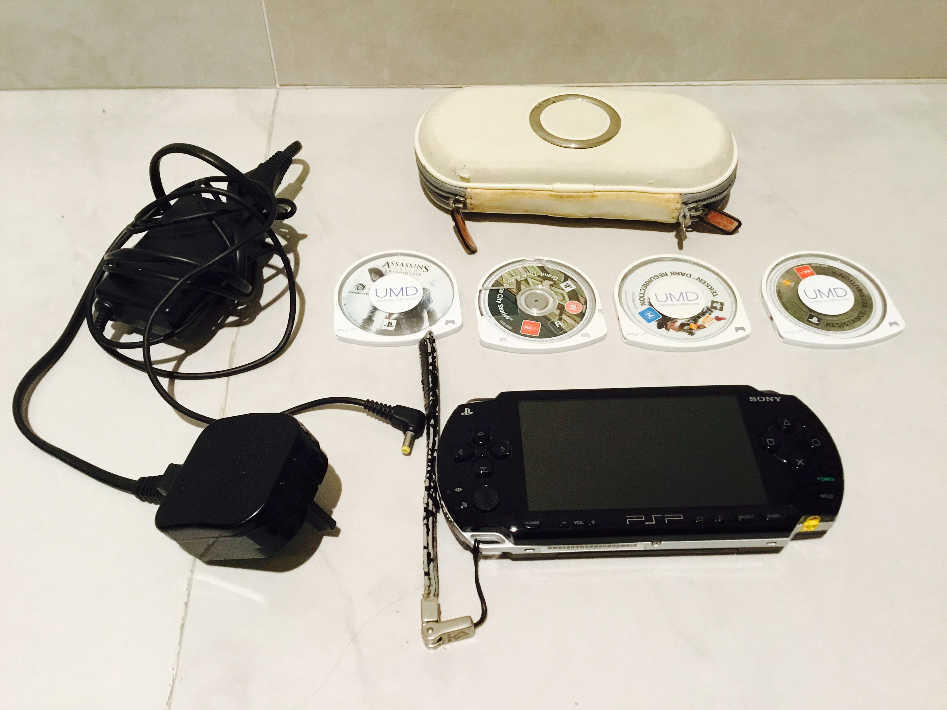 Sony PSP Full Set with adaptor charger , casing + 4 original UMD Games ...