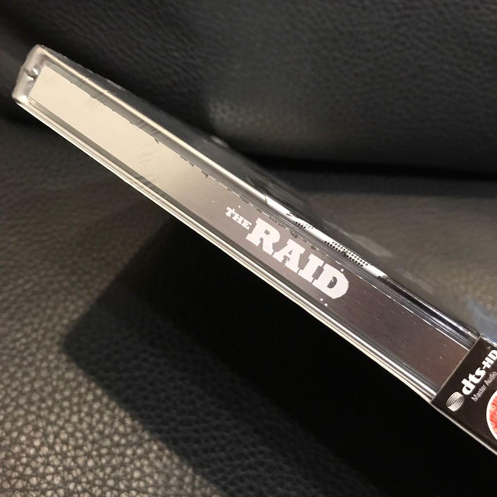 THE RAID Blu-ray Steelbooks (1) Play.com UK Exclusive Debossed Edition ...