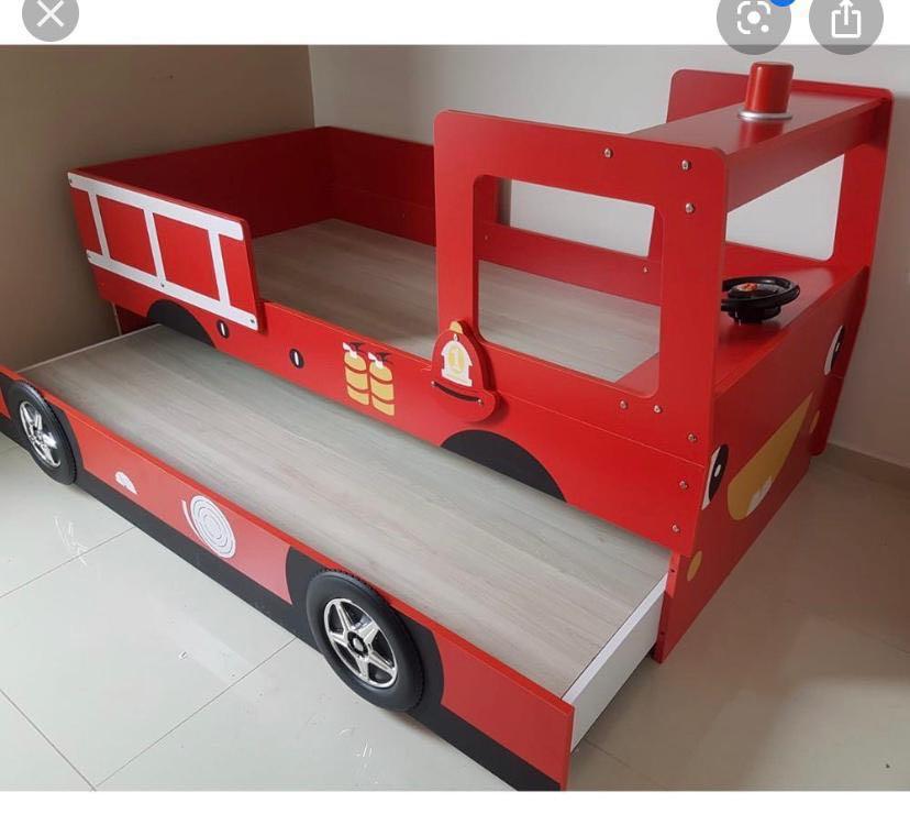 Fire Engine kids bed with extra pull out trundle bed. Used only once ...