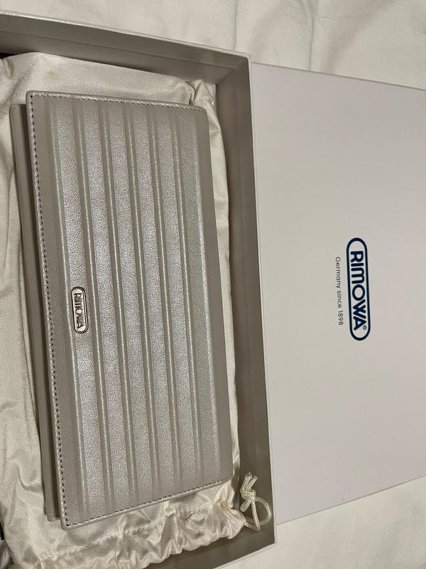 Rimowa leather purse, Luxury, Bags & Wallets on Carousell