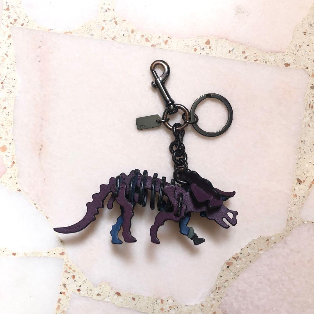Coach, Dinosaur skeleton Keychain, Luxury, Bags & Wallets on Carousell