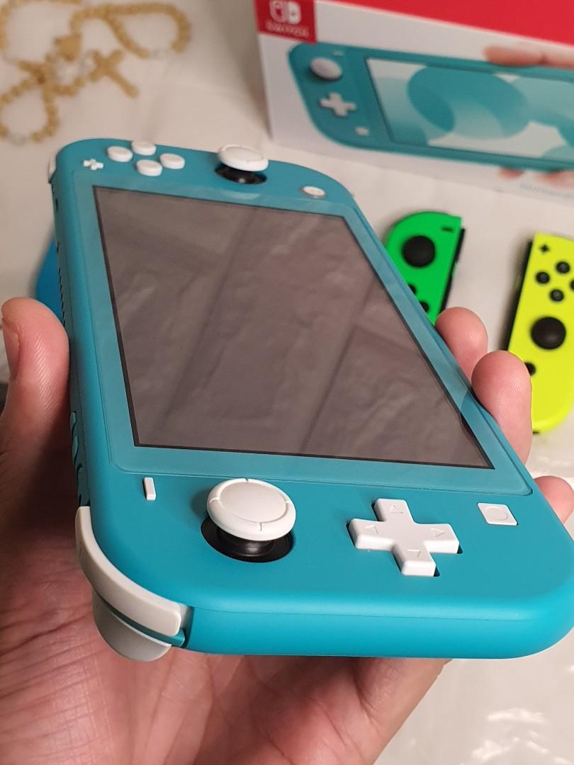 Nintendo Switch Lite Teal Like New with Zelda BOTW, Pokemon, Stardew ...