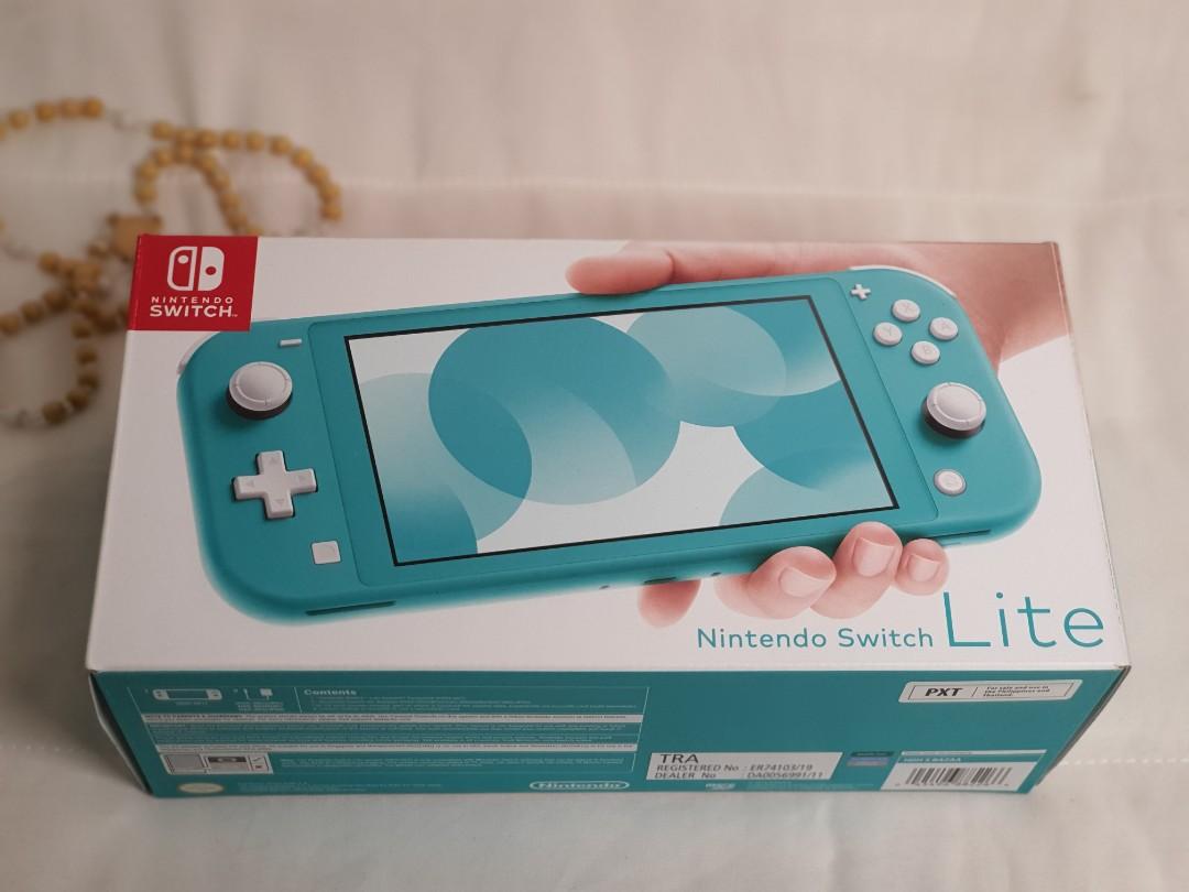 Nintendo Switch Lite Teal Like New with Zelda BOTW, Pokemon, Stardew ...