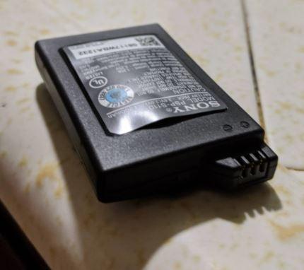 PSP battery bloated swollen bulged - buying for cash, Toys & Games ...