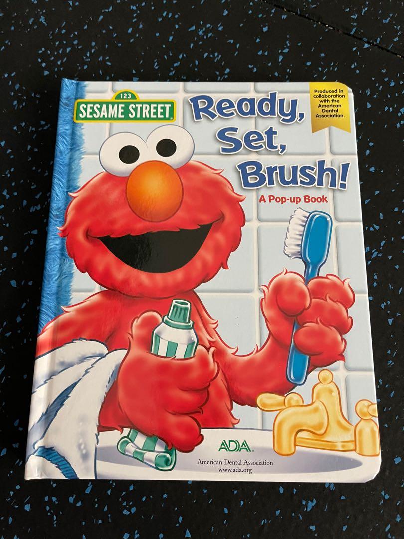 Sesame Street Elmo Ready set brush teeth pull pop up book, Hobbies ...