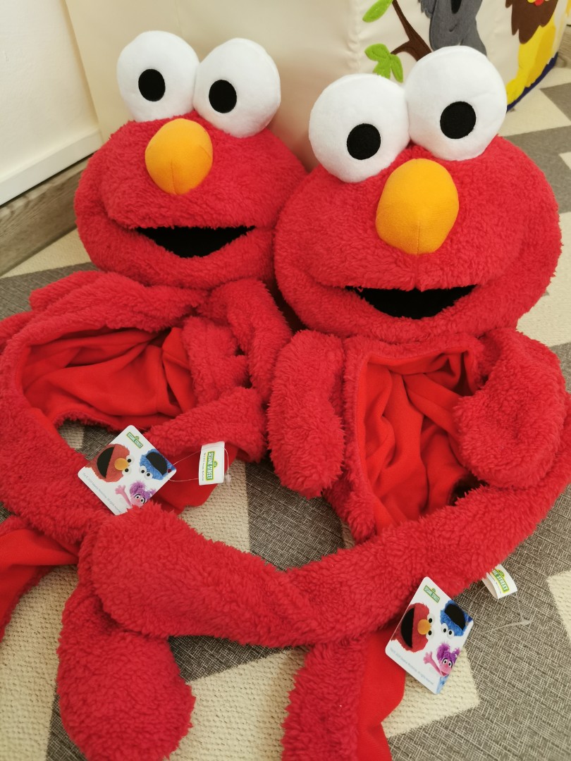 Elmo plush hat, Hobbies & Toys, Toys & Games on Carousell