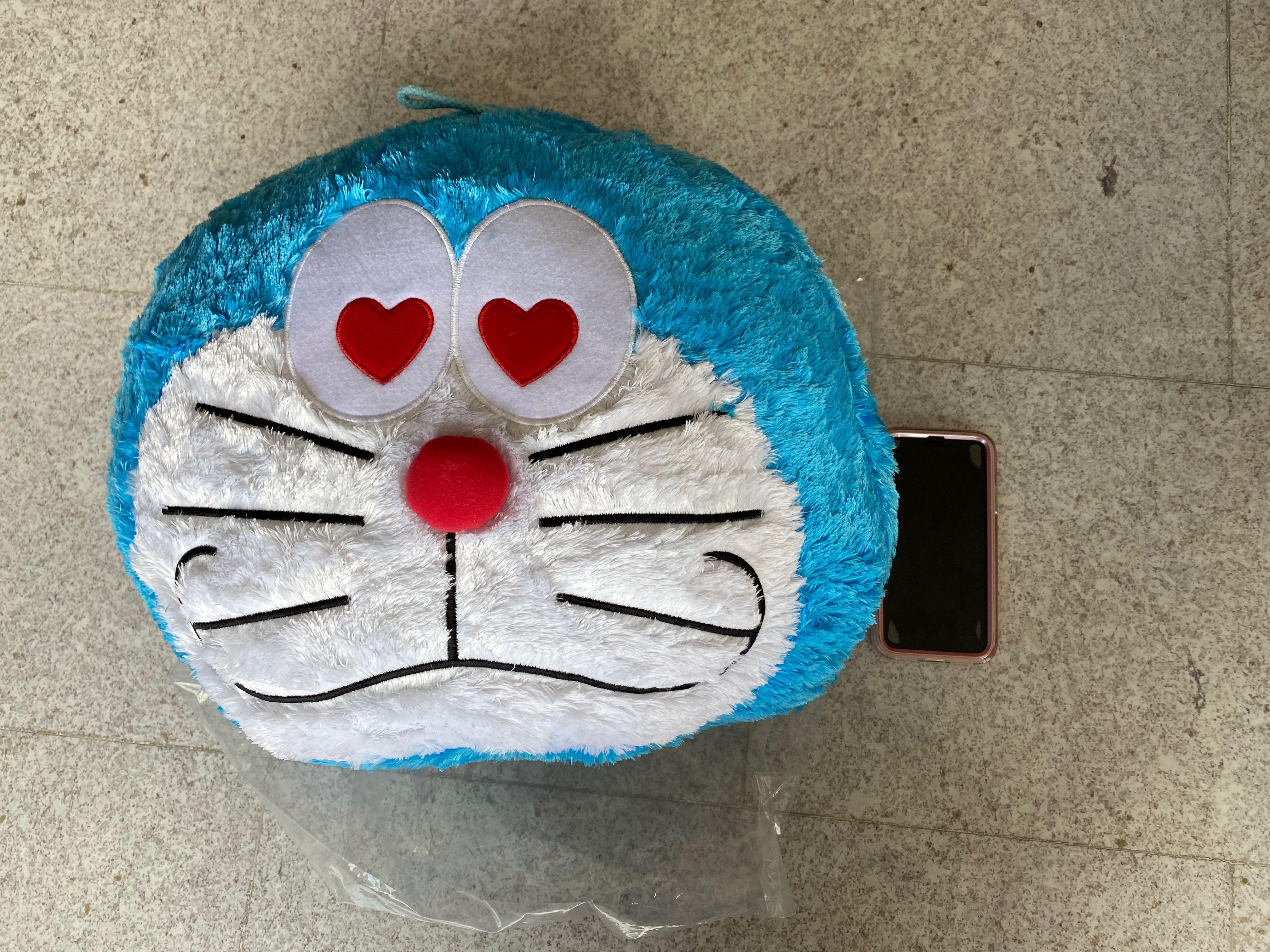 Doraemon face plushie, Hobbies & Toys, Toys & Games on Carousell