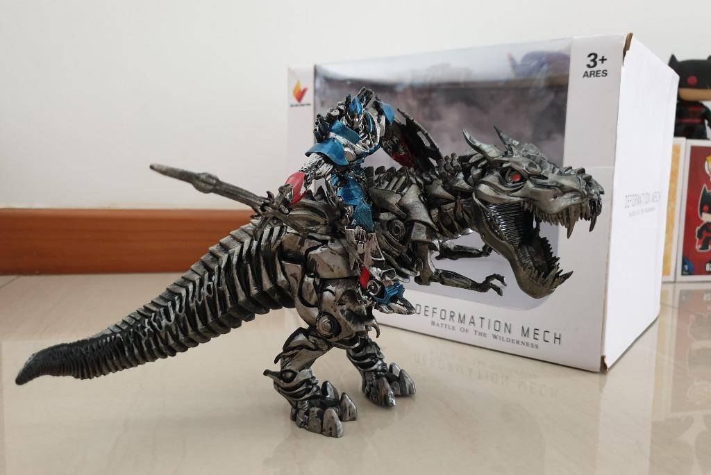 Collectible Optimus Prime Tyrannosaurus Transformer, Toys & Games ...