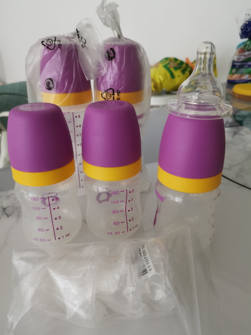 Tupperware Milk Bottle and teat, Babies & Kids, Nursing & Feeding ...