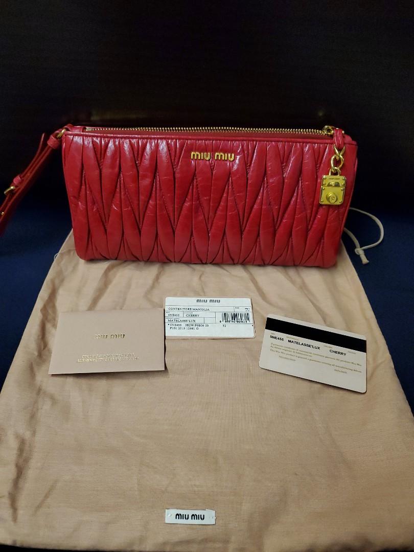 Authentic Mui Mui Clutch bag, Luxury, Bags & Wallets on Carousell
