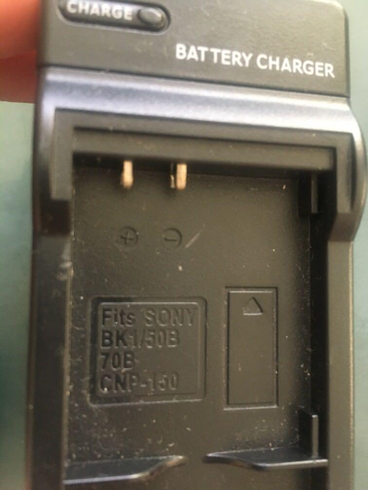 Sony/Sharp battery charger for cameras, Photography, Cameras on Carousell