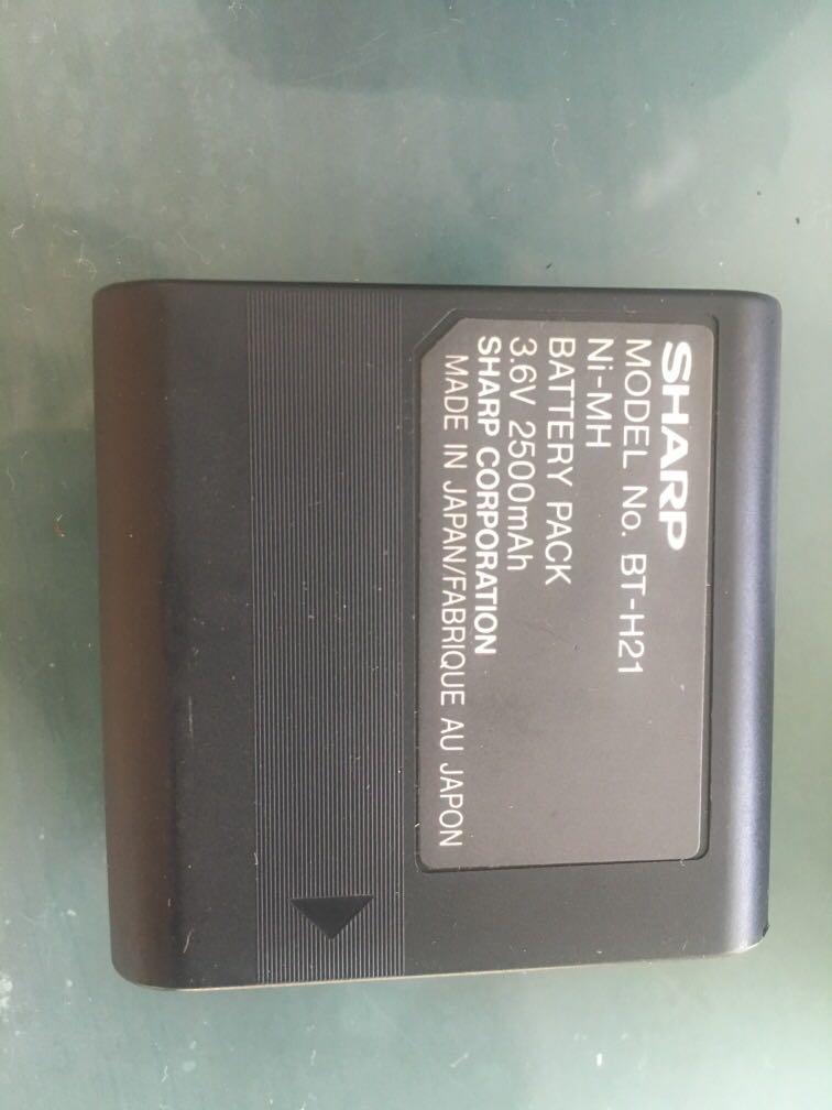 Sony/Sharp battery charger for cameras, Photography, Cameras on Carousell