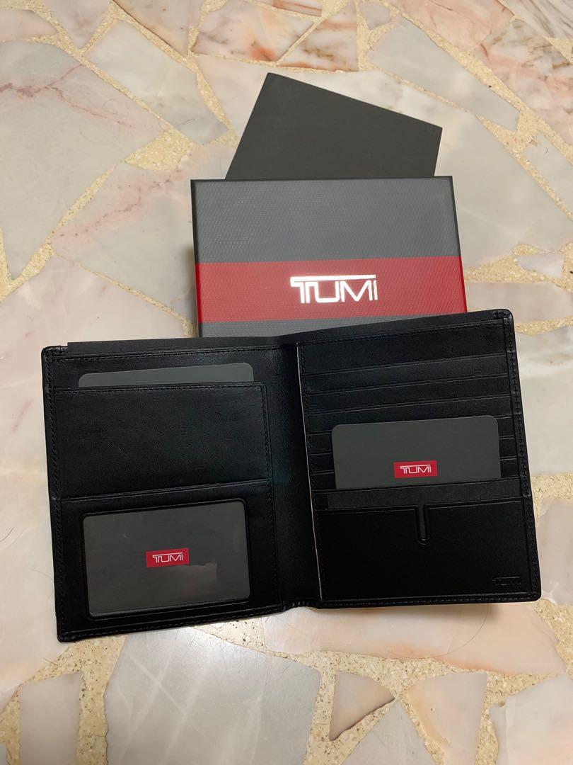 Authentic Tumi Passport Cover, Hobbies & Toys, Travel, Travel ...
