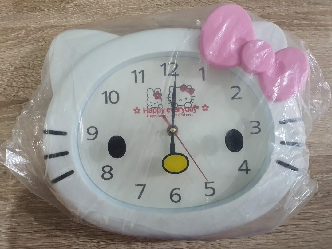 Hello kitty clock, Hobbies & Toys, Toys & Games on Carousell