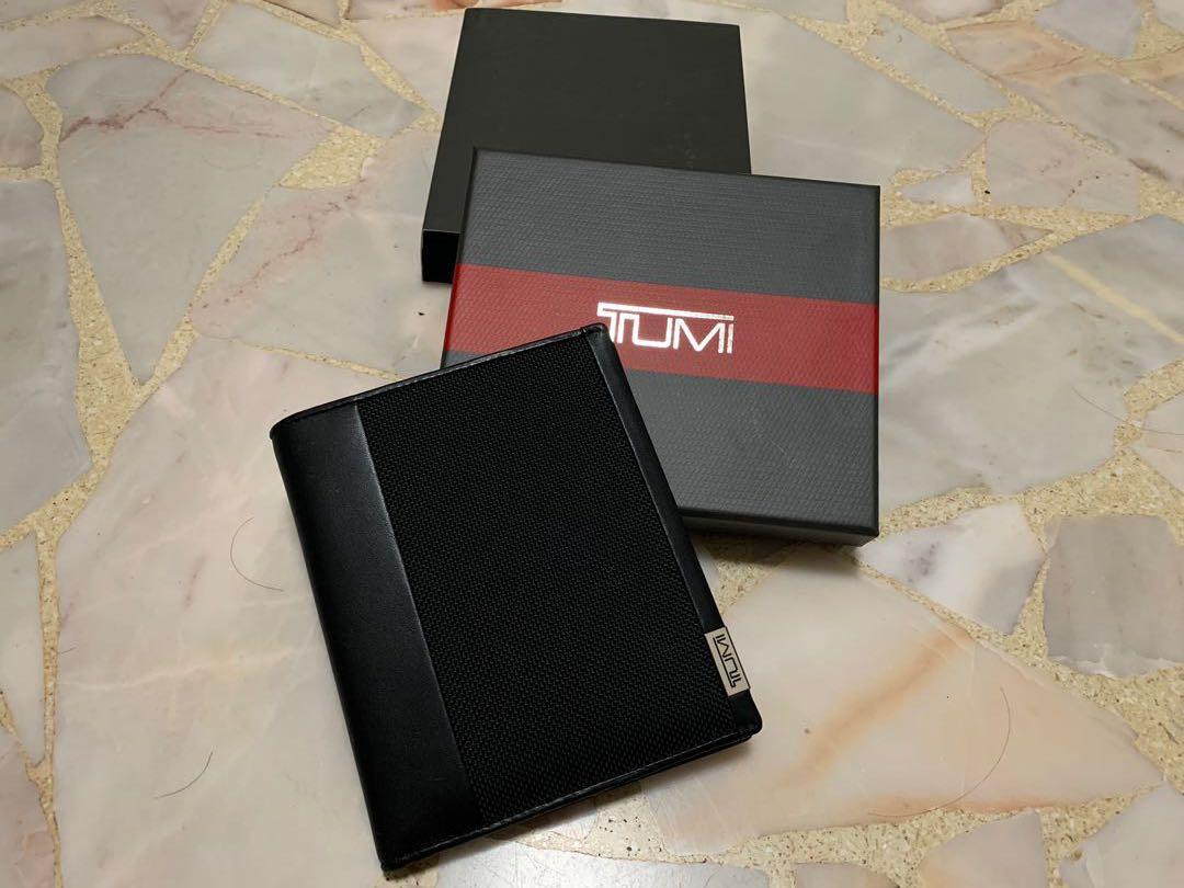Authentic Tumi Passport Cover, Hobbies & Toys, Travel, Travel ...