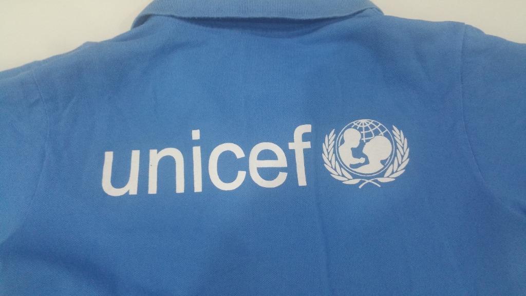Vintage UNICEF Polo, Men's Fashion, Coats, Jackets and Outerwear on ...