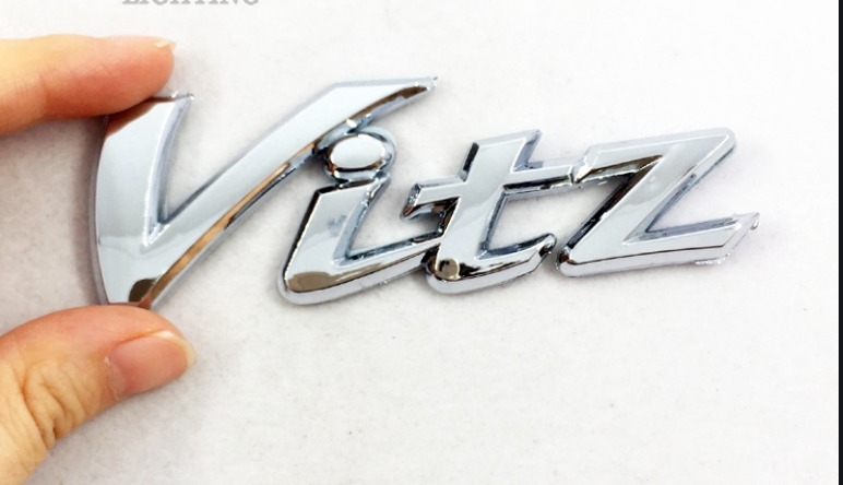 Toyota Vitz Emblem Logo with adhesive stick on type, Car Parts ...