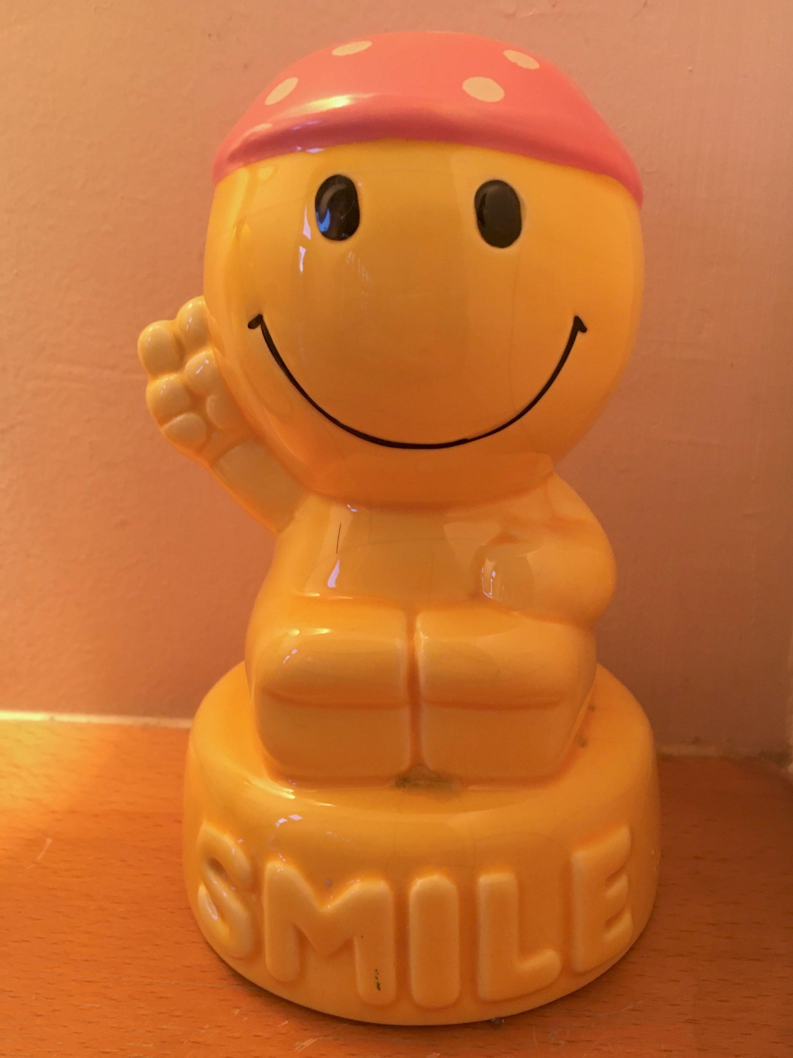 Smiley face piggy coin bank, Hobbies & Toys, Toys & Games on Carousell