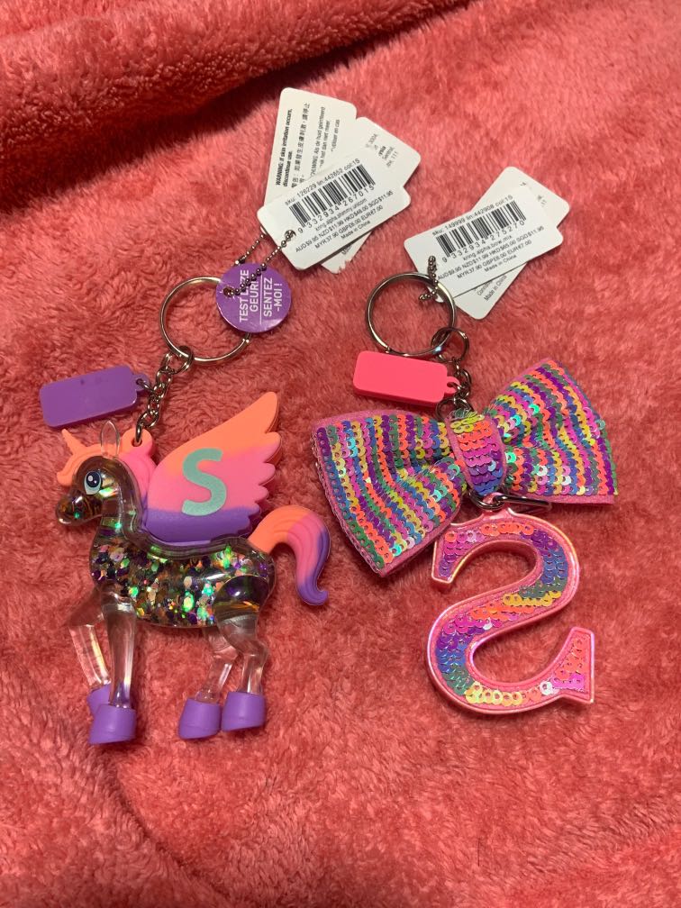 Smiggle S keychain, Women's Fashion, Watches & Accessories, Other ...