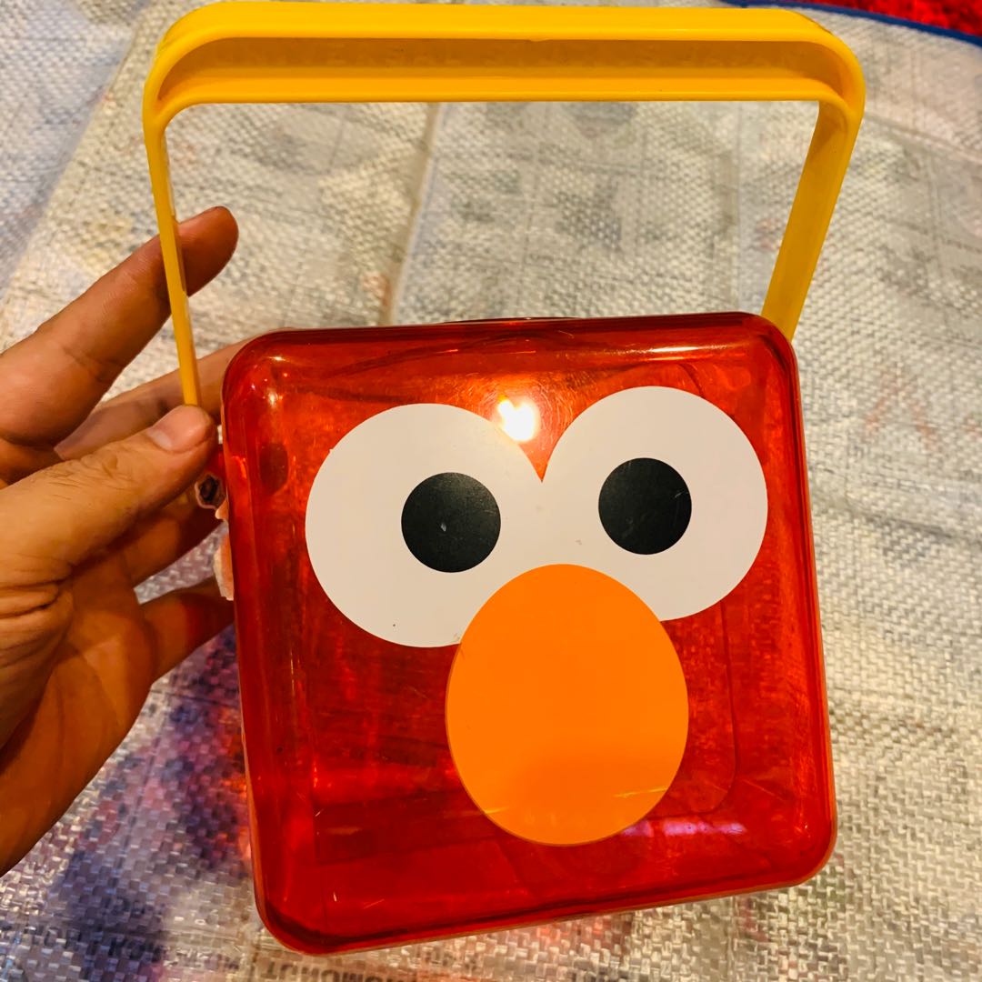 Sesame street elmo container, Hobbies & Toys, Toys & Games on Carousell