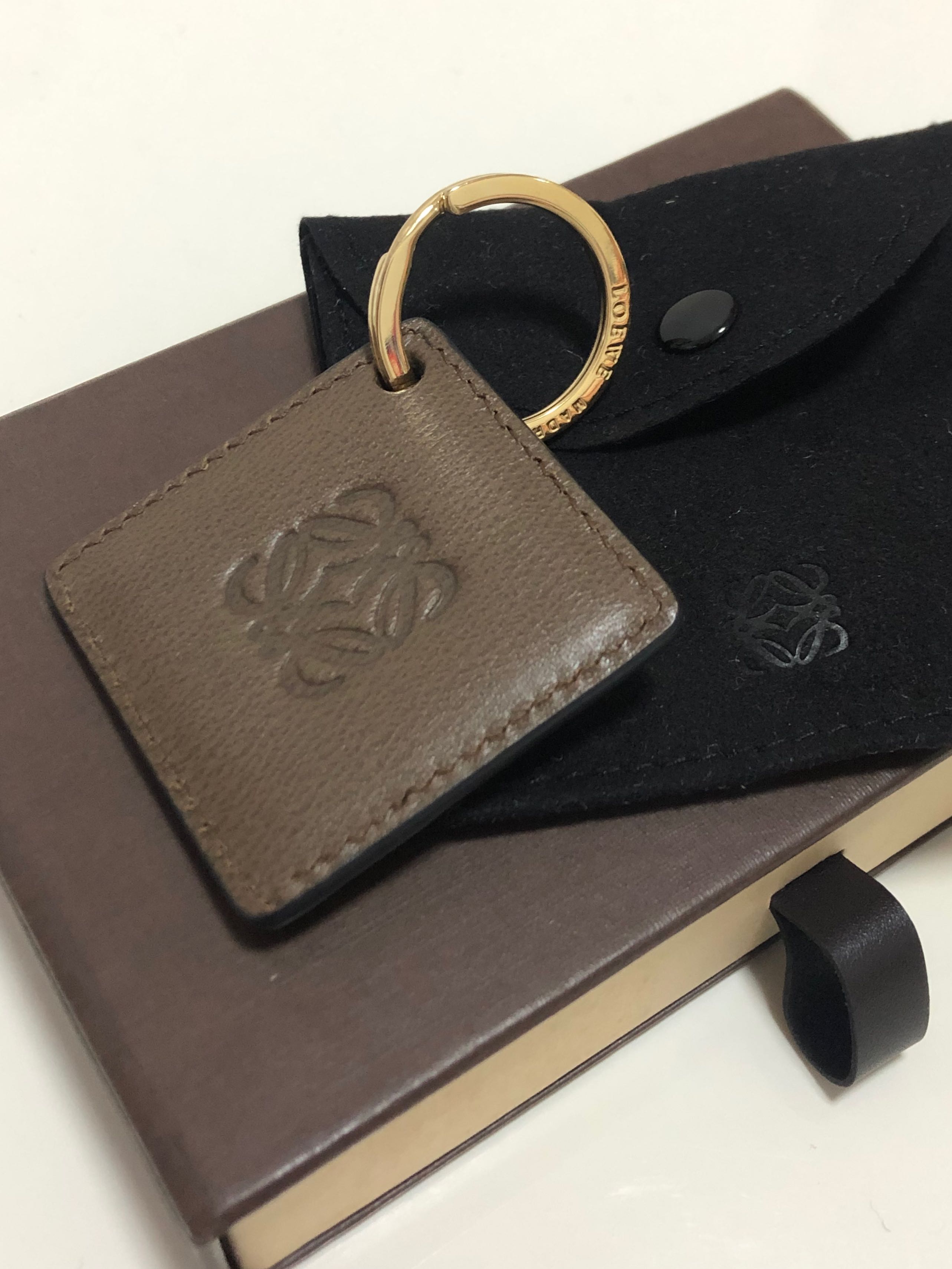 Loewe keychain, Luxury, Accessories on Carousell