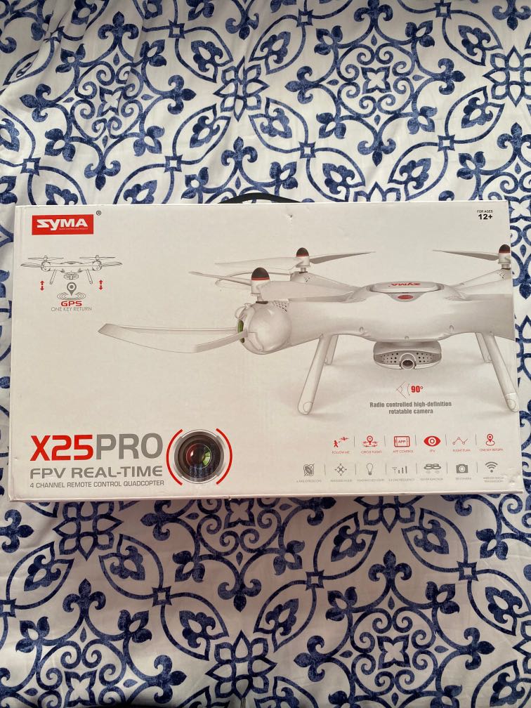 SYMA X25 PRO, Photography, Drones on Carousell