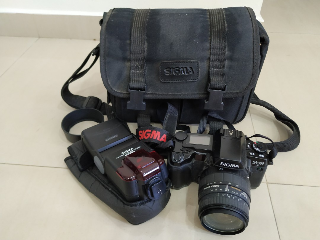 Used Sigma SA-300 + EF-430 Flash, Photography, Cameras on Carousell