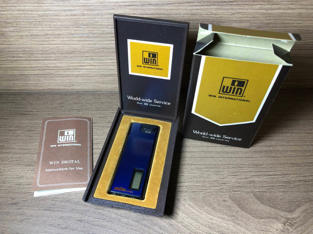 Win International automatic lighter w digital watch fluid type made in ...