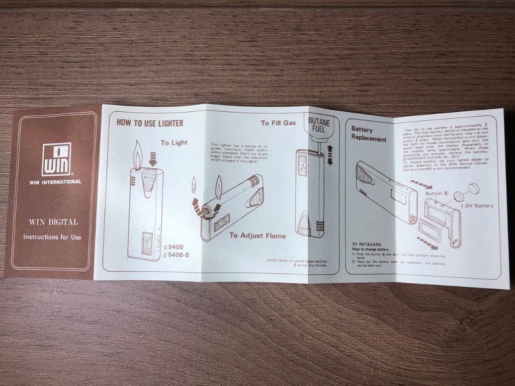 Win International automatic lighter w digital watch fluid type made in ...