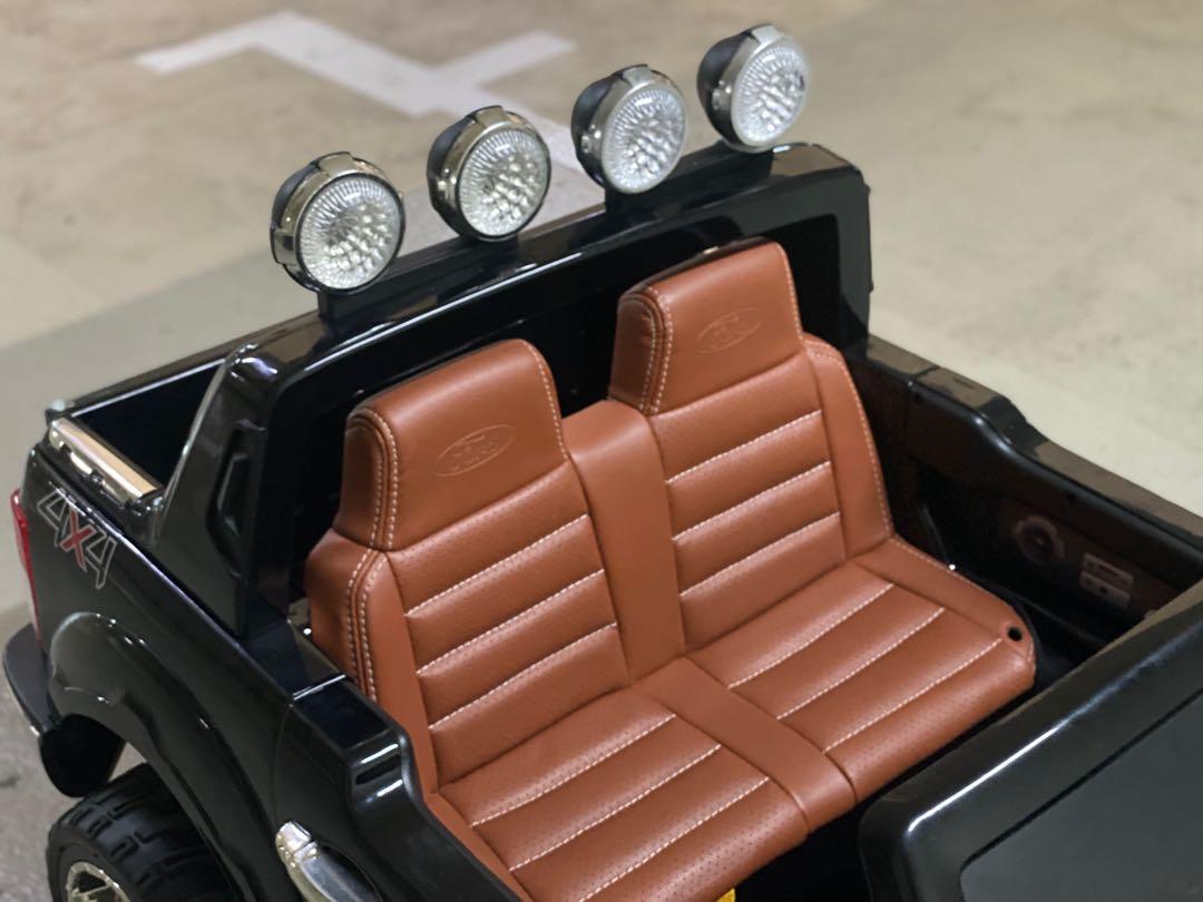 Ford Ranger kids electric car / double seater, Babies & Kids, Baby ...