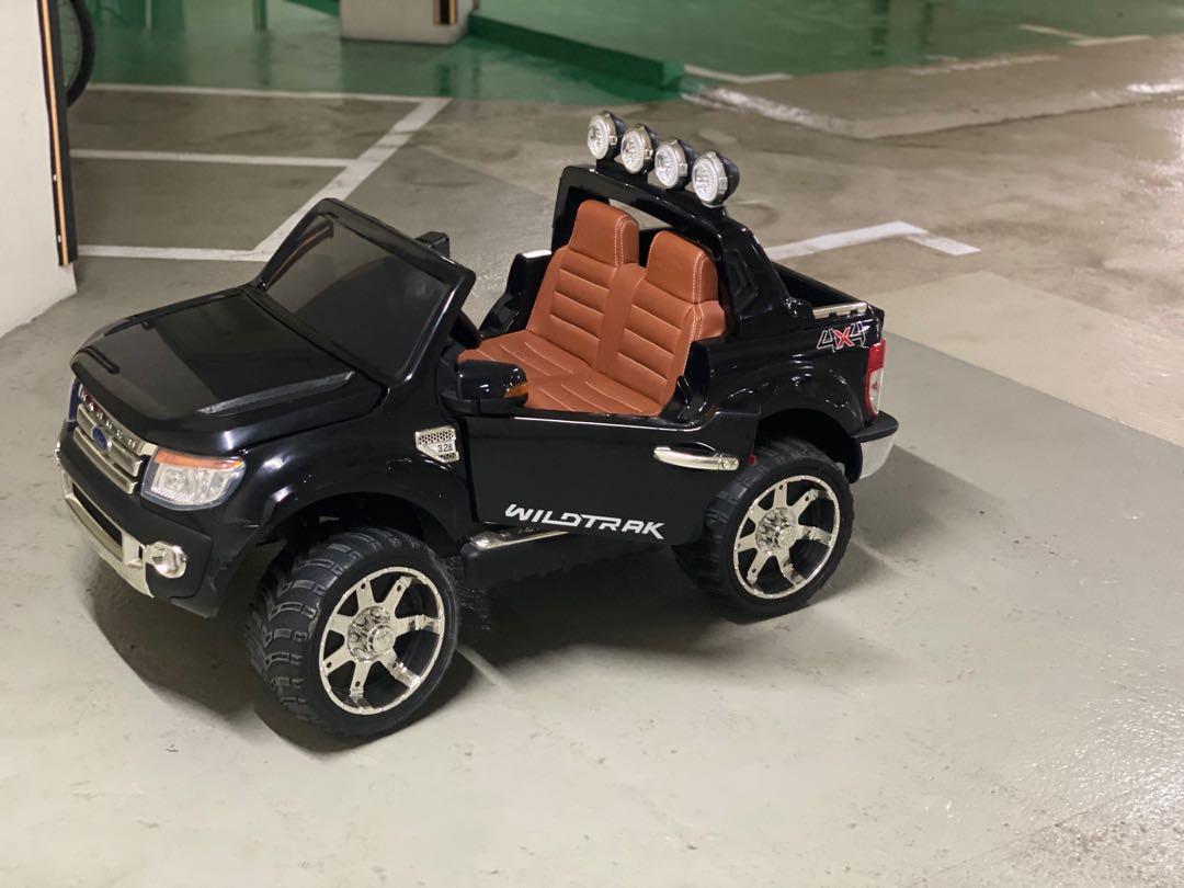 Ford Ranger kids electric car / double seater, Babies & Kids, Baby ...