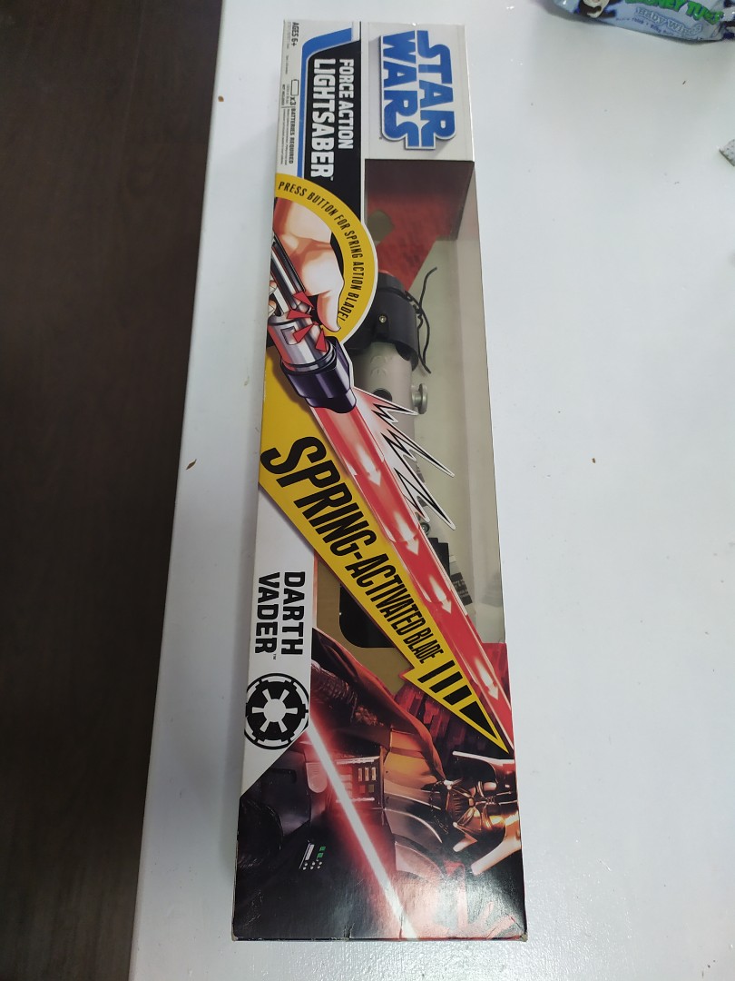 Darth Vader spring action lightsaber, Hobbies & Toys, Toys & Games on ...