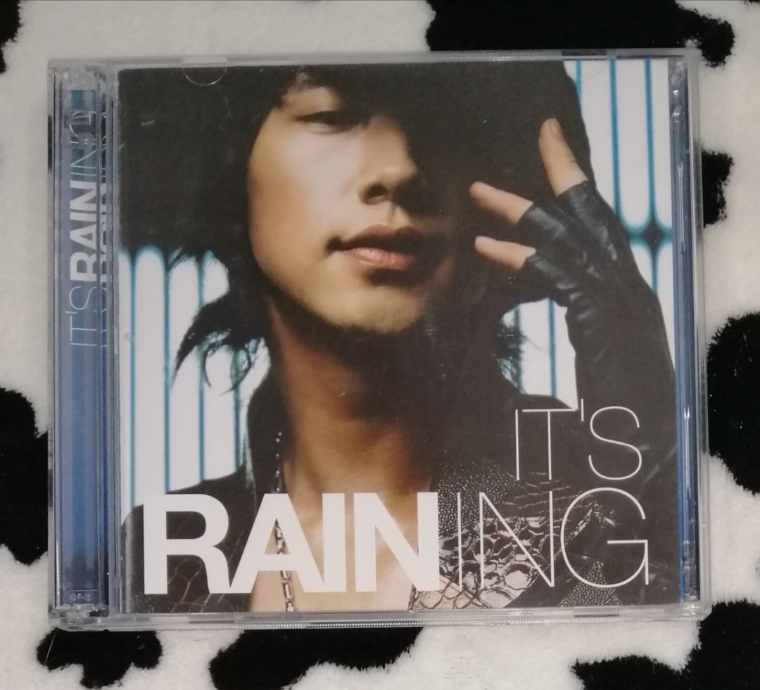 CD IT'S RAIN ING CD & DVD 2 IN 1, Hobbies & Toys, Music & Media, CDs & DVDs on Carousell