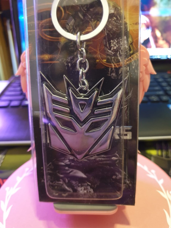Decepticons Transformer keychain, Everything Else on Carousell