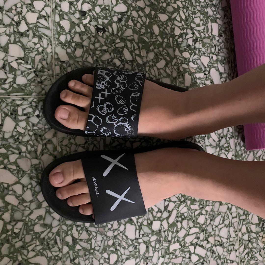 KAWS slides, Women's Fashion, Footwear, Flipflops and Slides on Carousell