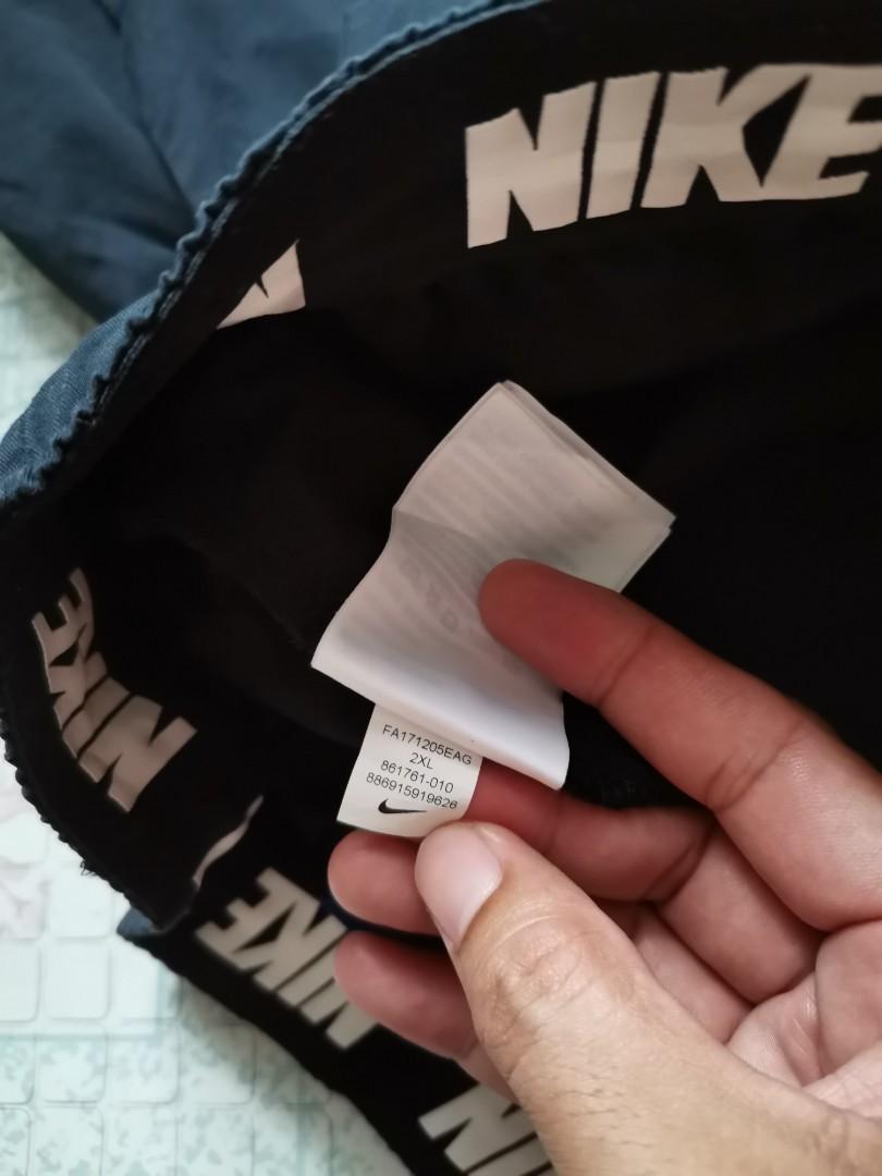 nike blue tag pants, Men's Fashion, Bottoms, Joggers on Carousell