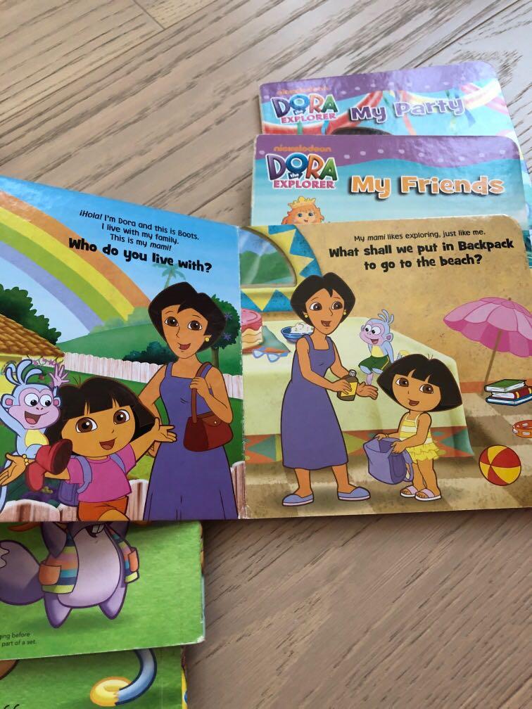 7 Dora books. 1 big A4 bubble magnet book. And 6 hard board story ...
